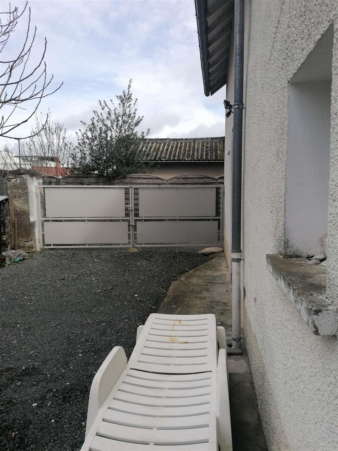 Maison centre ville de la Coquille avec jardin clos 800 M2